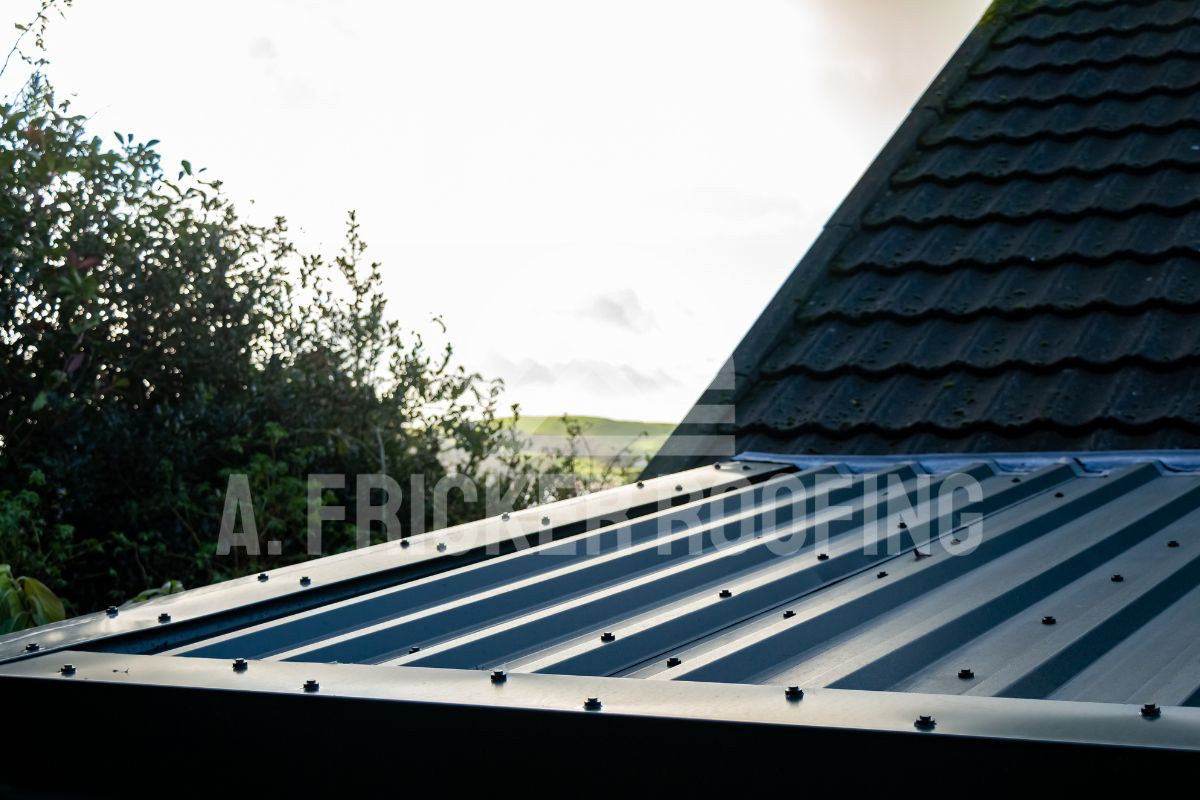 Standing Seam vs. Exposed Fastener Metal Roofing Systems
