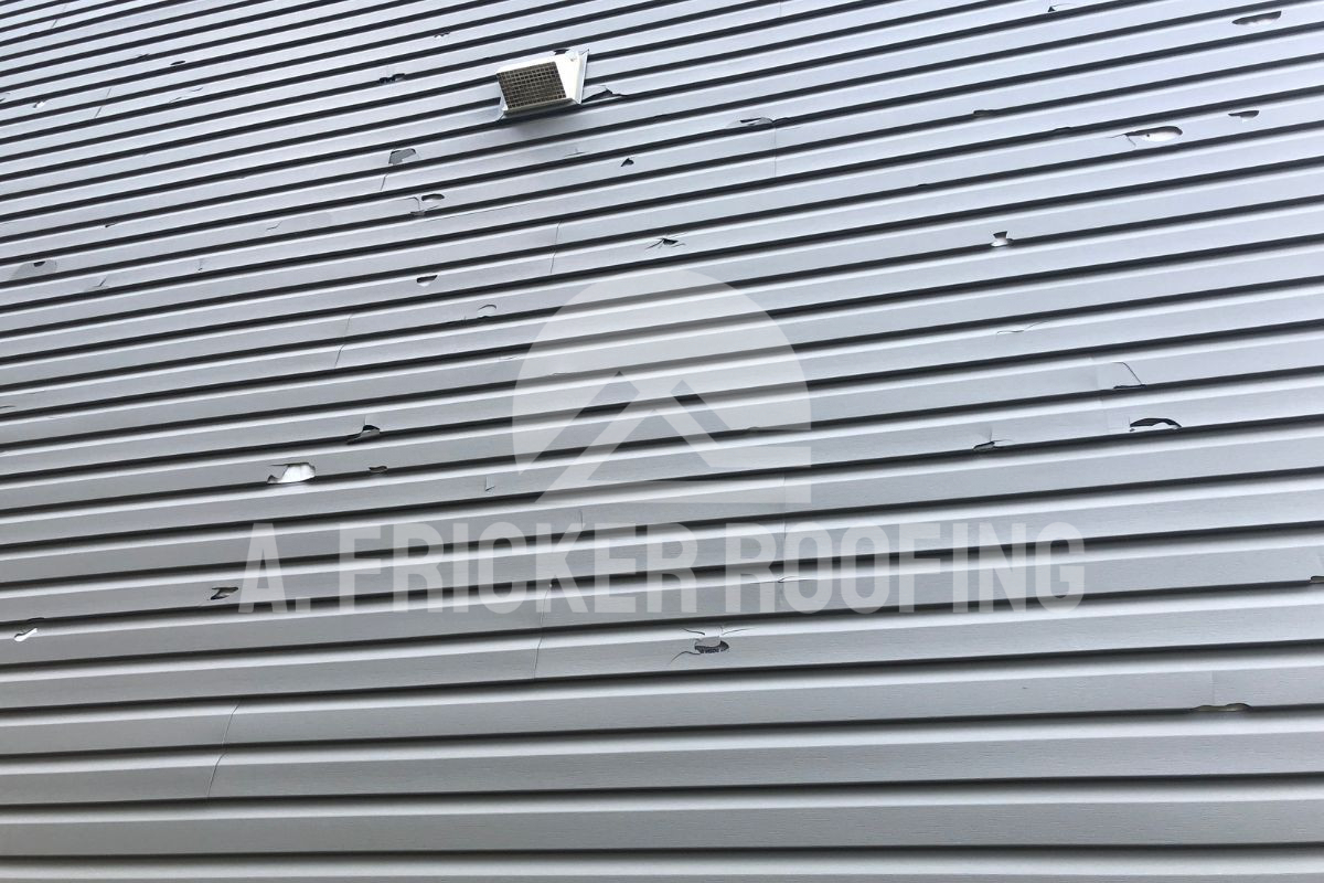 Signs of Hail Damage on Vinyl Siding and How to Fix Them